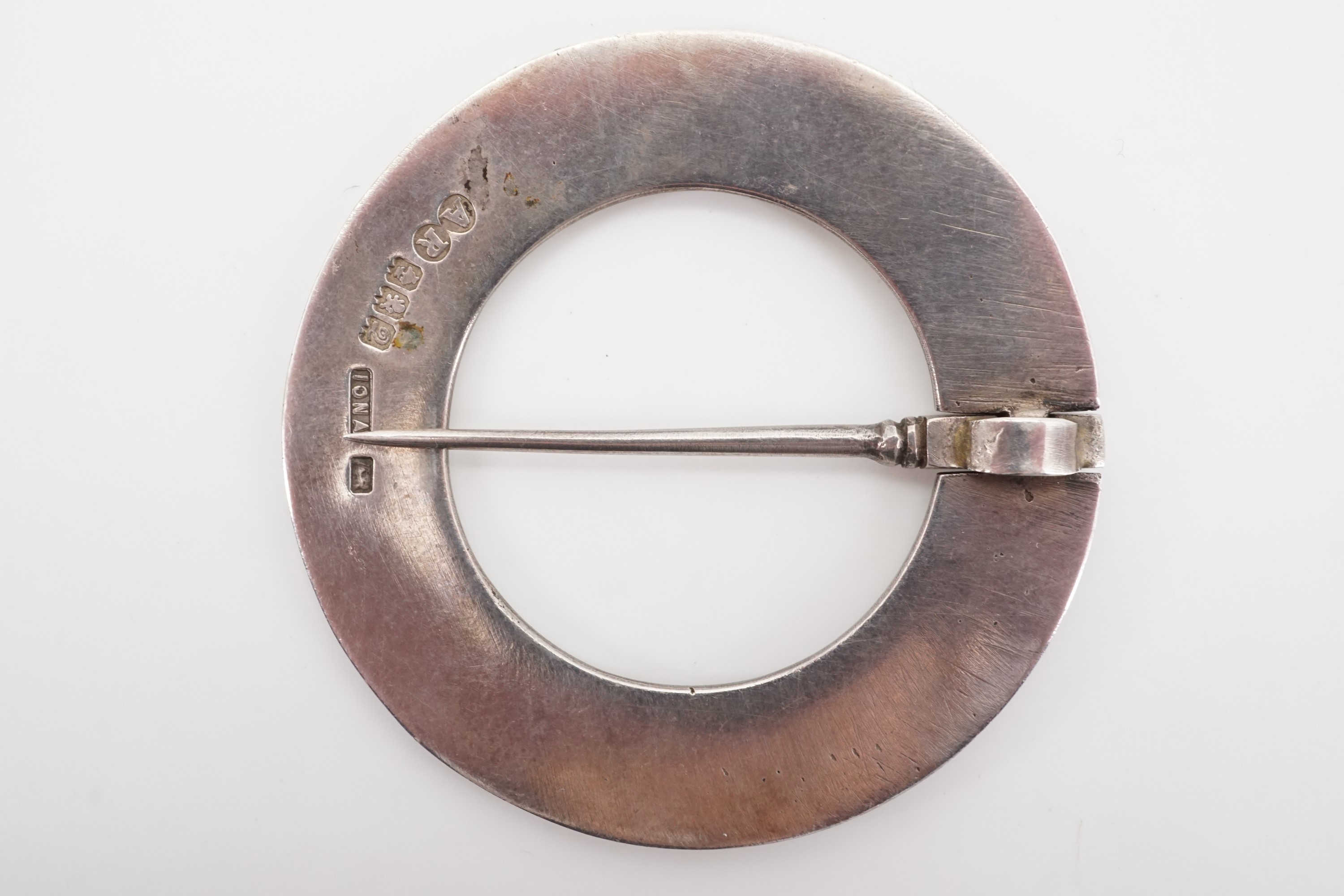 An Alexander Ritchie Iona Scottish silver penannular type brooch, of ...