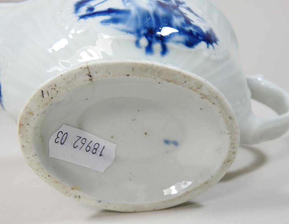 A Lowestoft porcelain blue and white sauce boat, circa 1770, of moulded ...