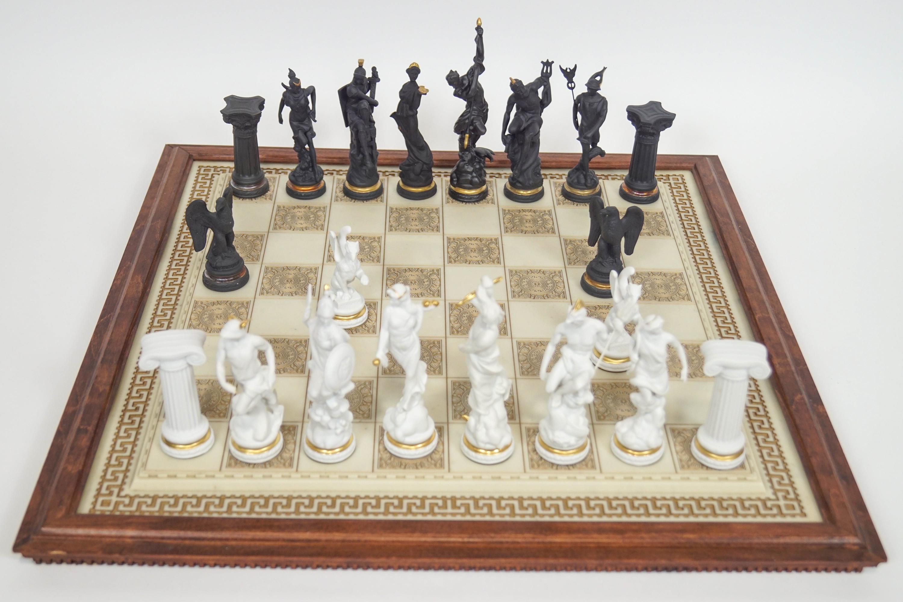 A Franklin Mint black and white porcelain 'The Chess set of the Gods ...