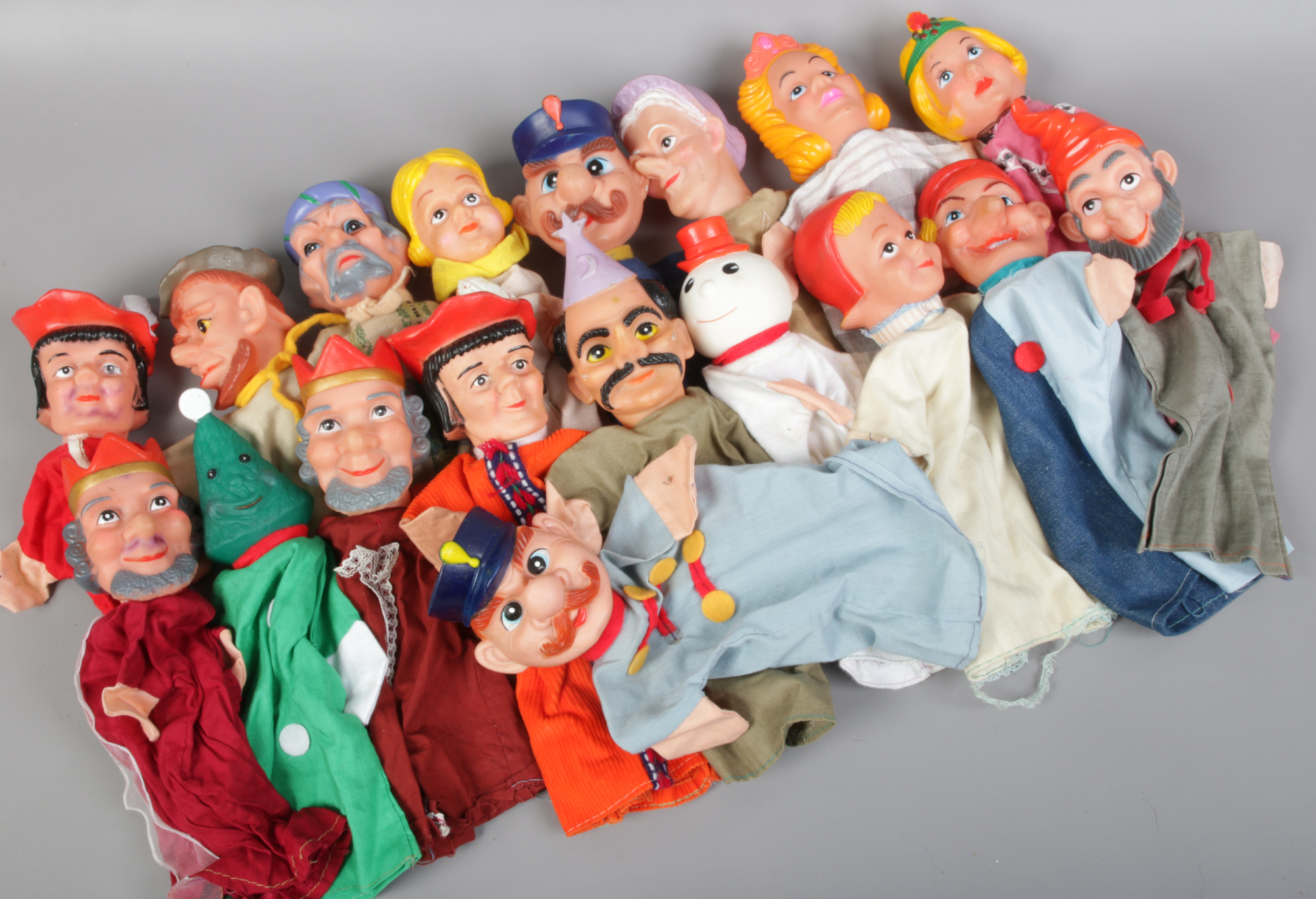 A quantity of continental 1960s hand puppets, approximately 18.