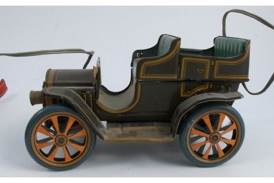 Four TM Modern Toys of Japan tin plate clockwork toy cars, various ...