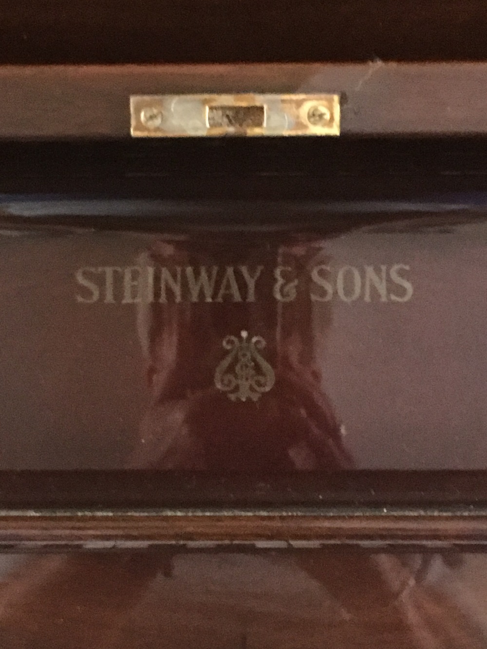 Steinway (c1938)A Model V upright piano in a mahogany case.