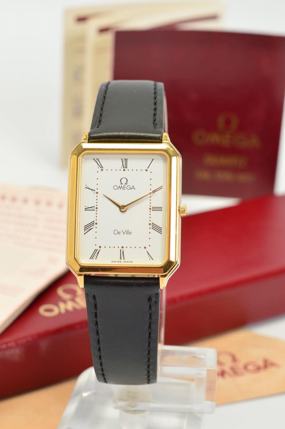 A 1980'S OMEGA DE VILLE QUARTZ WRISTWATCH, gold plated rectangular case ...