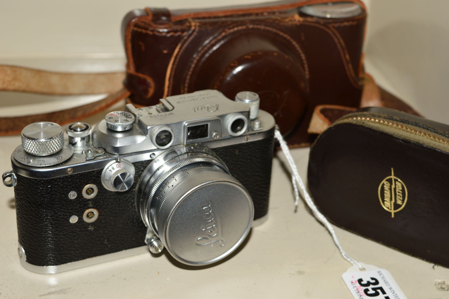 A REID & SIGRIST REID 3 RANGEFINDER CAMERA, fitted with a Leitz ...