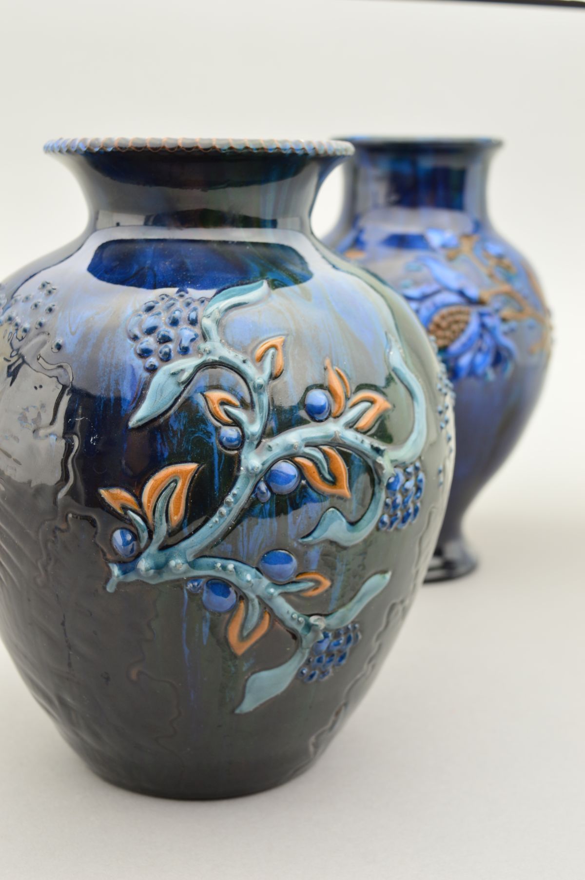 SIR EDMUND ELTON FOR SUNFLOWER POTTERY, a baluster shaped vase with ...