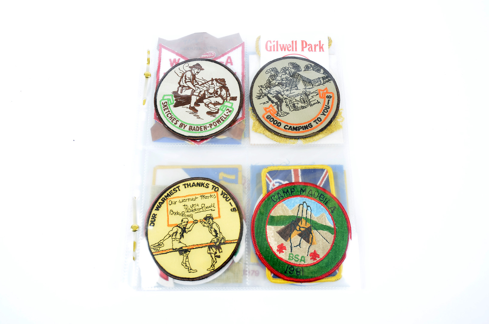 A collection of various American cloth badges, including Sketches by ...