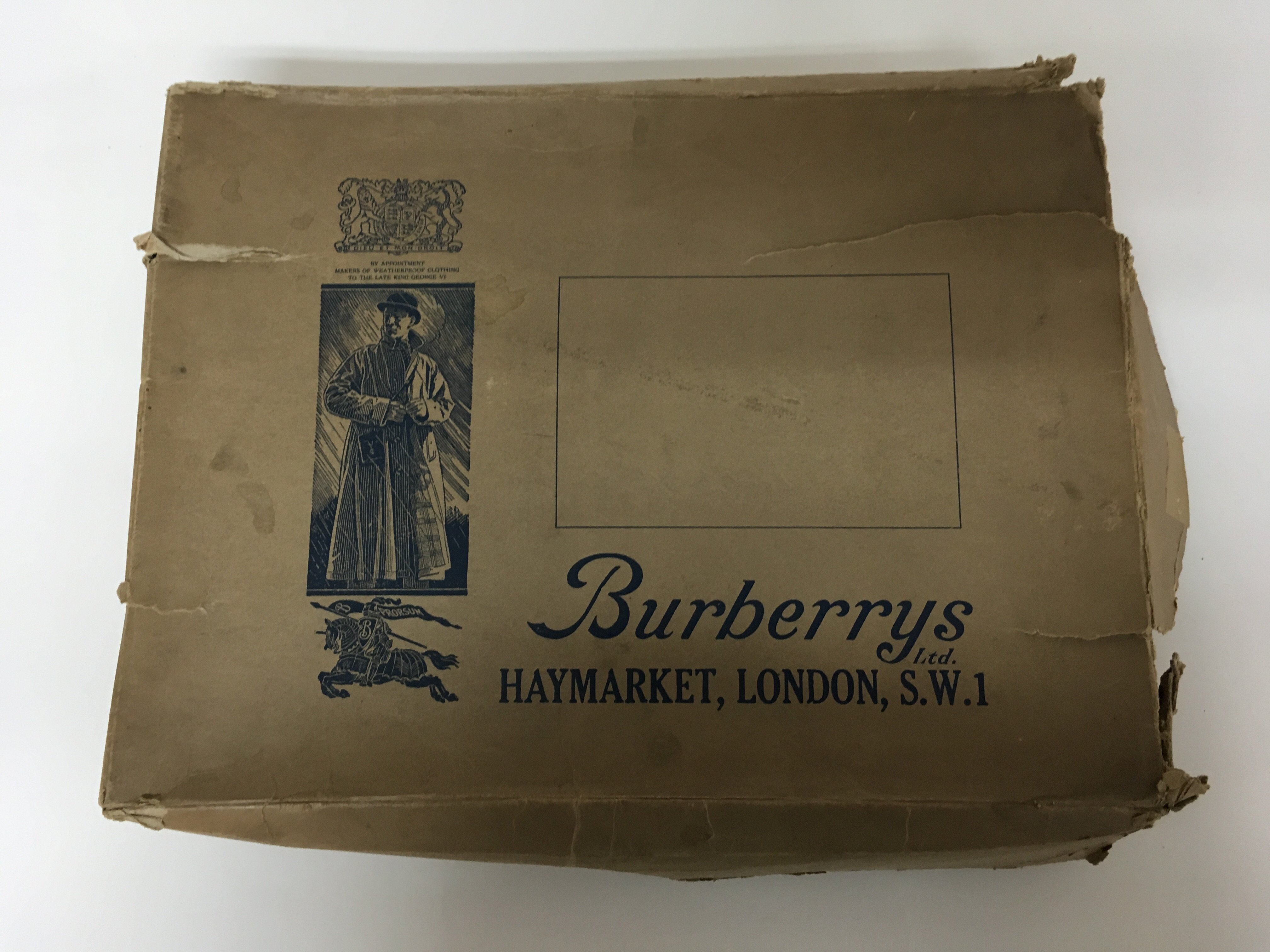 A collection of Burberry garment patterns and paper templates contained ...