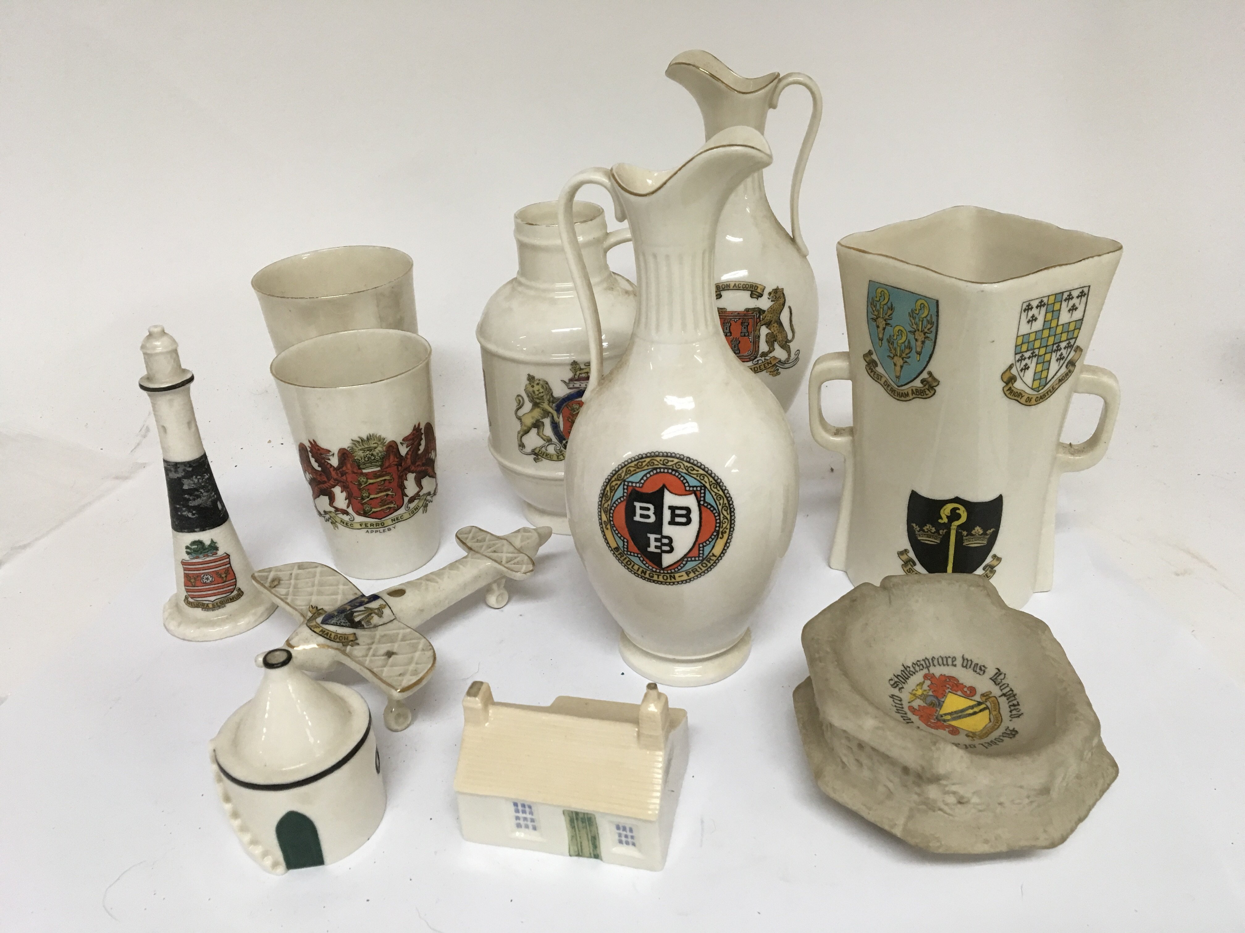 A collection of Goss and created ware including large size Ewer 20cm A ...
