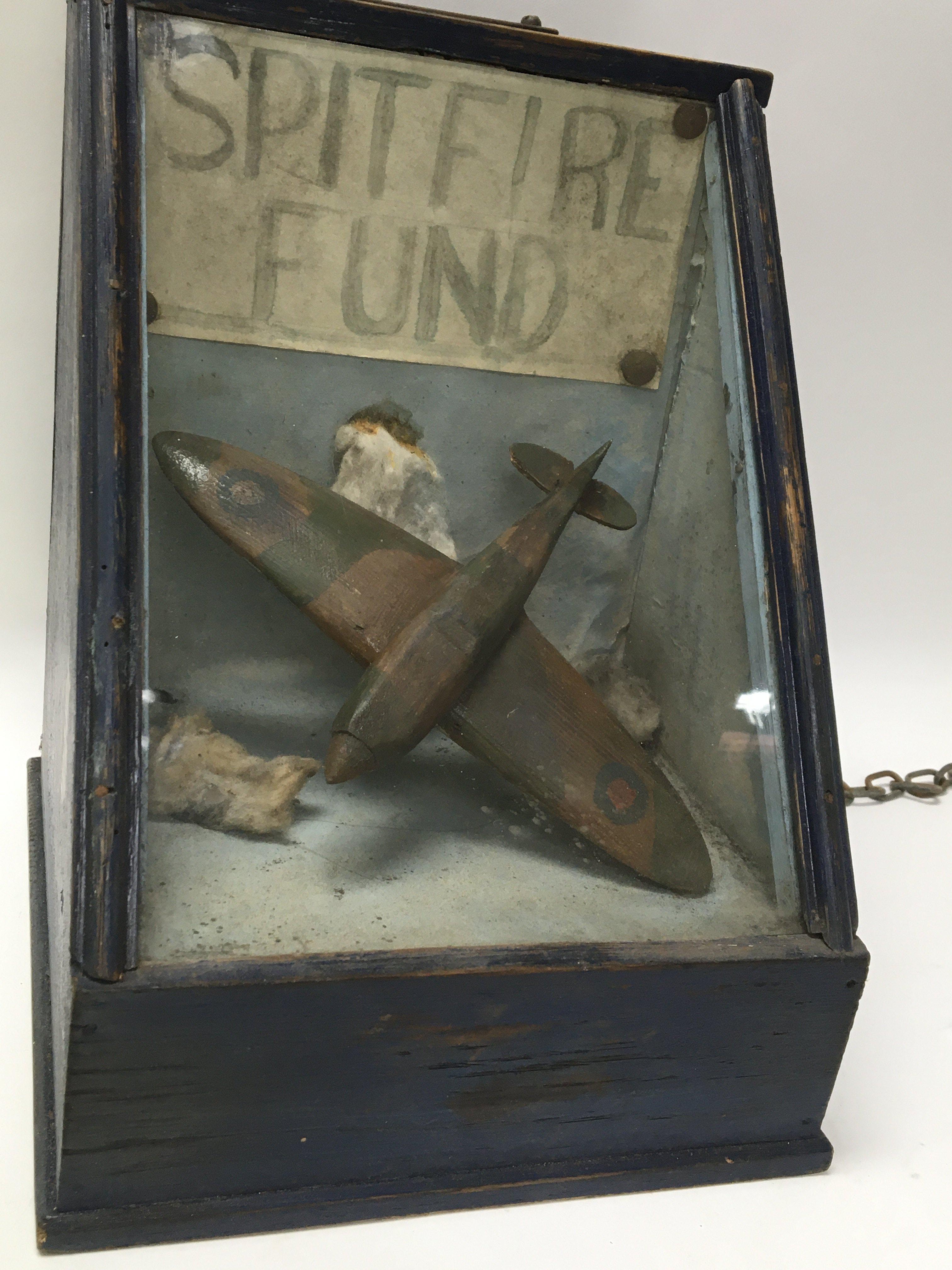 A spitfire fund donation box with glazed front 25 cm