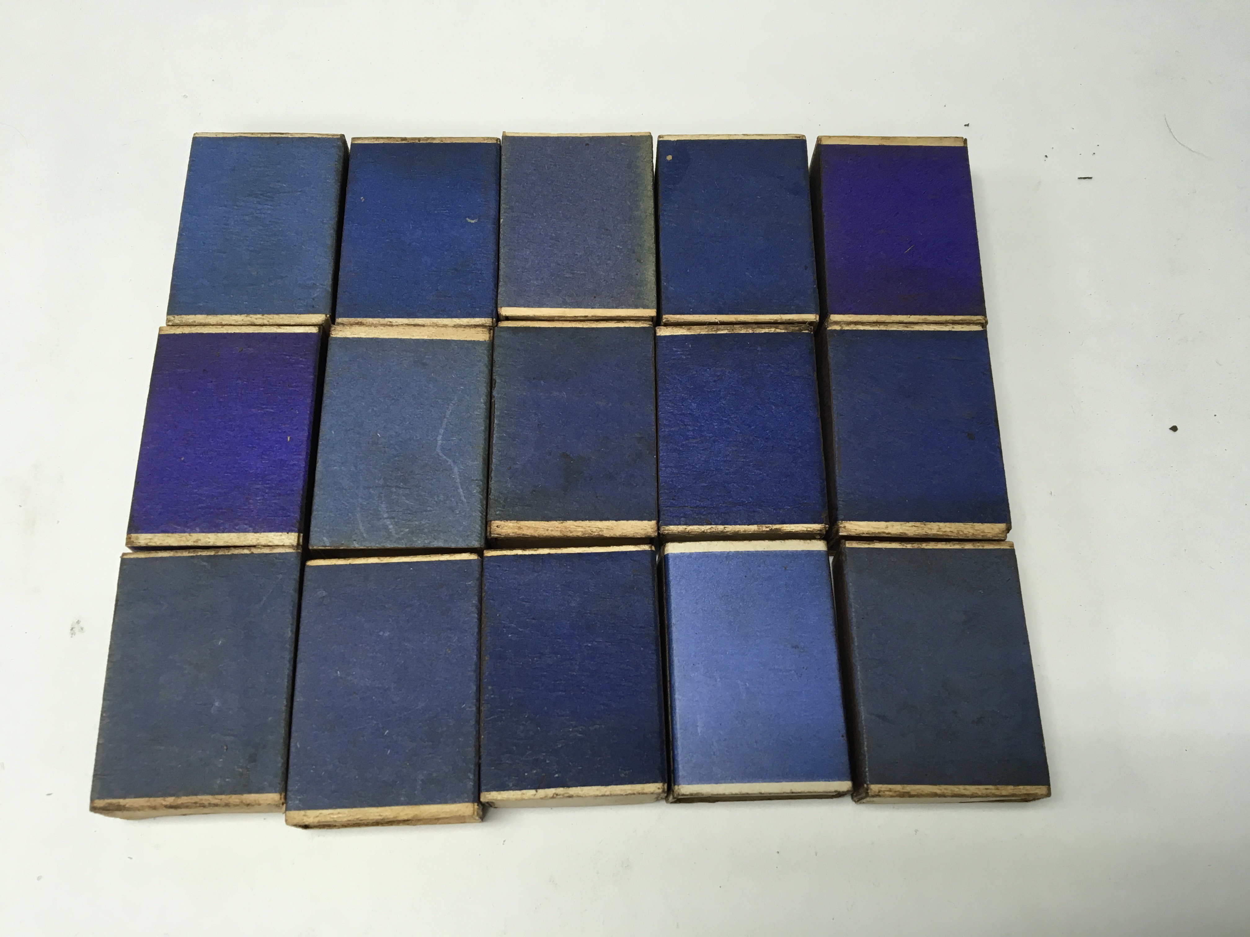 A group of 15 German WW2 style match boxes with matches.