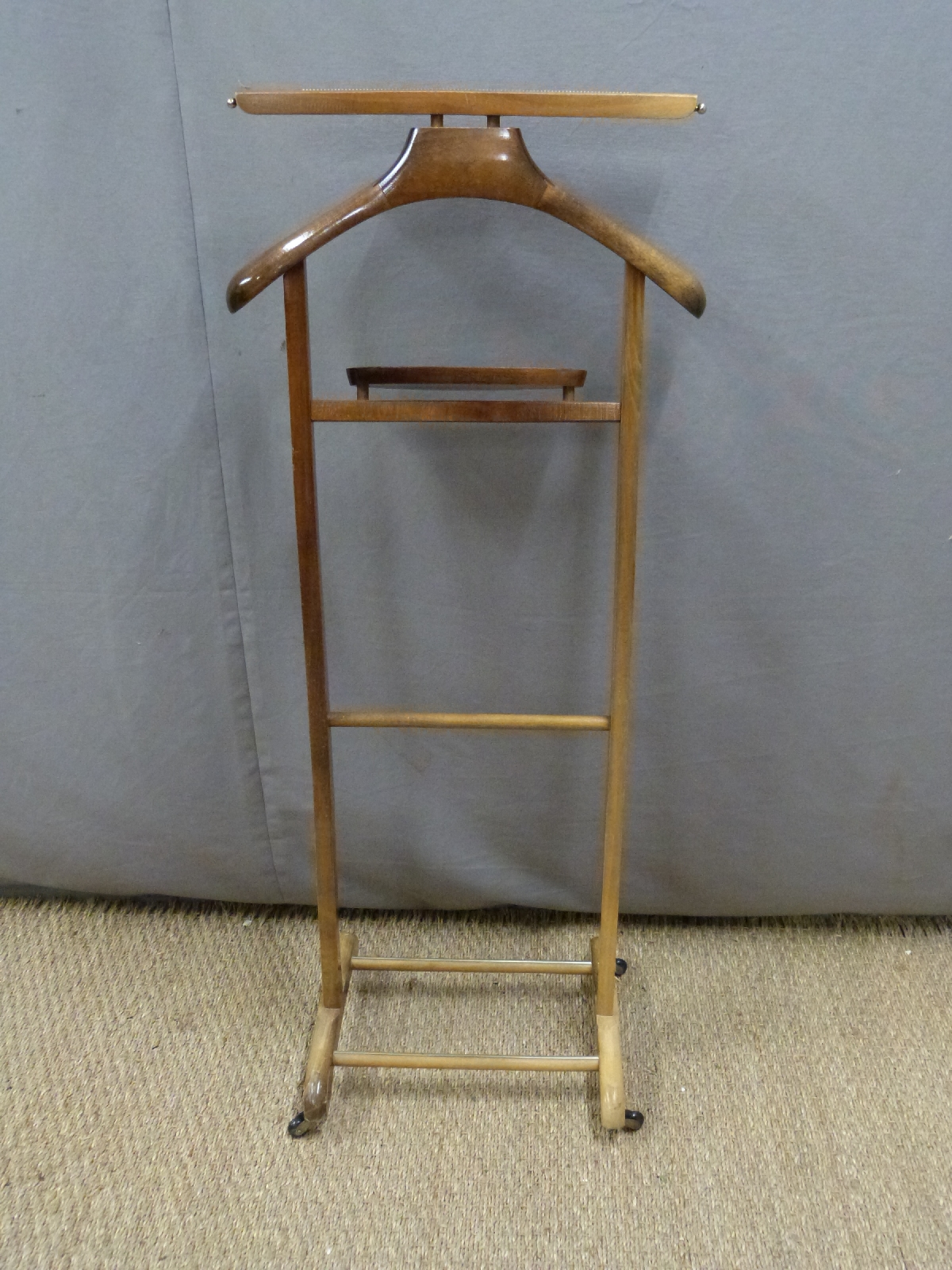A wooden valet stand