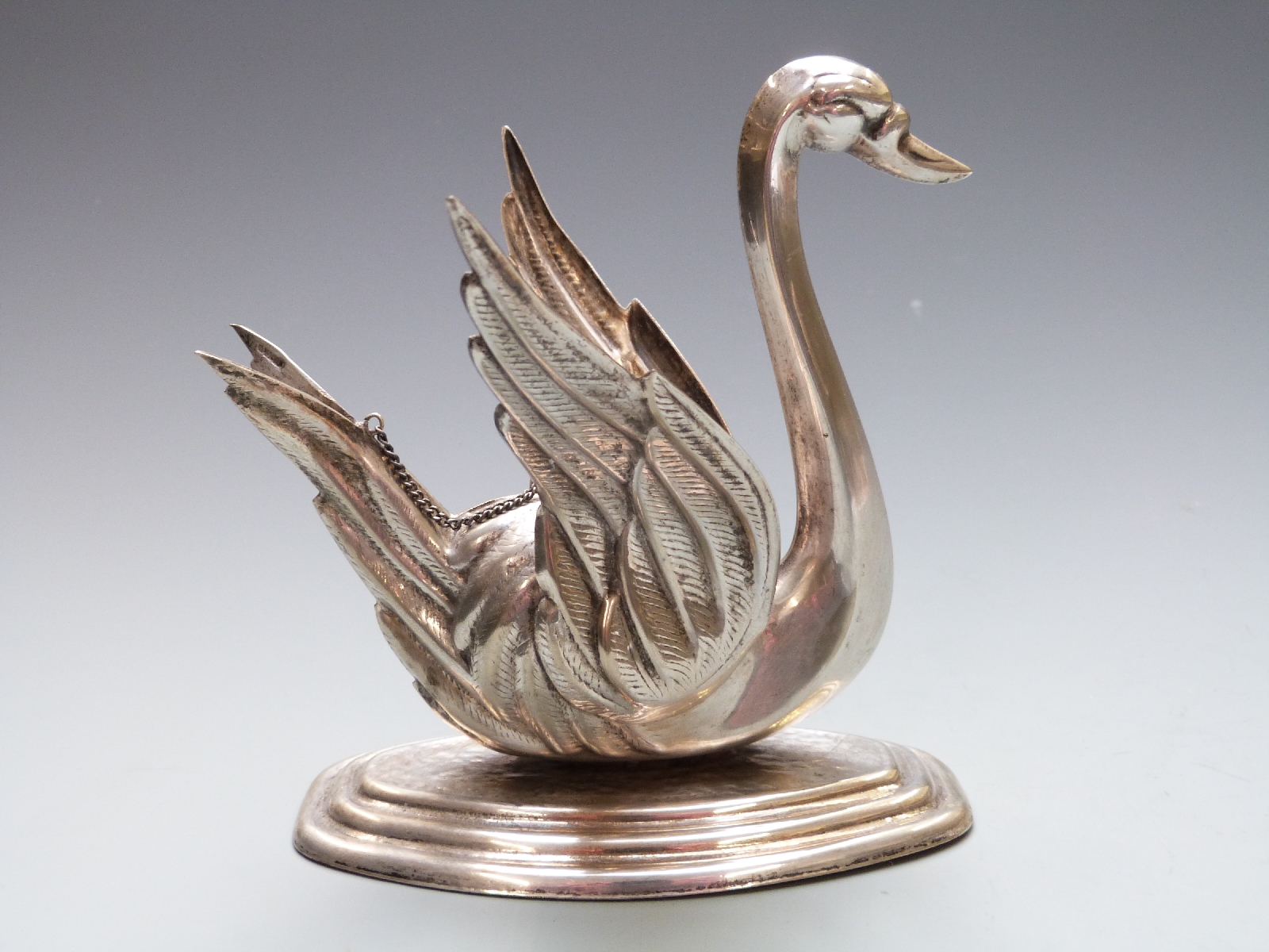 White metal novelty swan table lighter or similar ornament, marked to ...