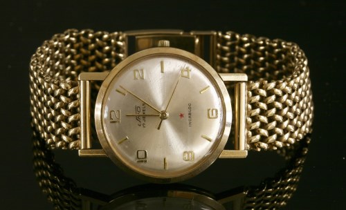 A gentlemen's 9ct gold Uno Incabloc mechanical watch, with a later 9ct ...