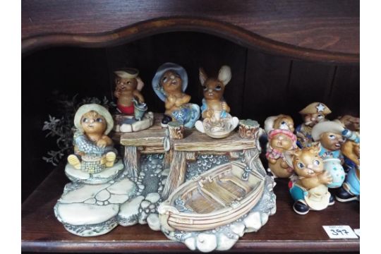 A quantity of Pendelfin figurines and display stands, largest ...