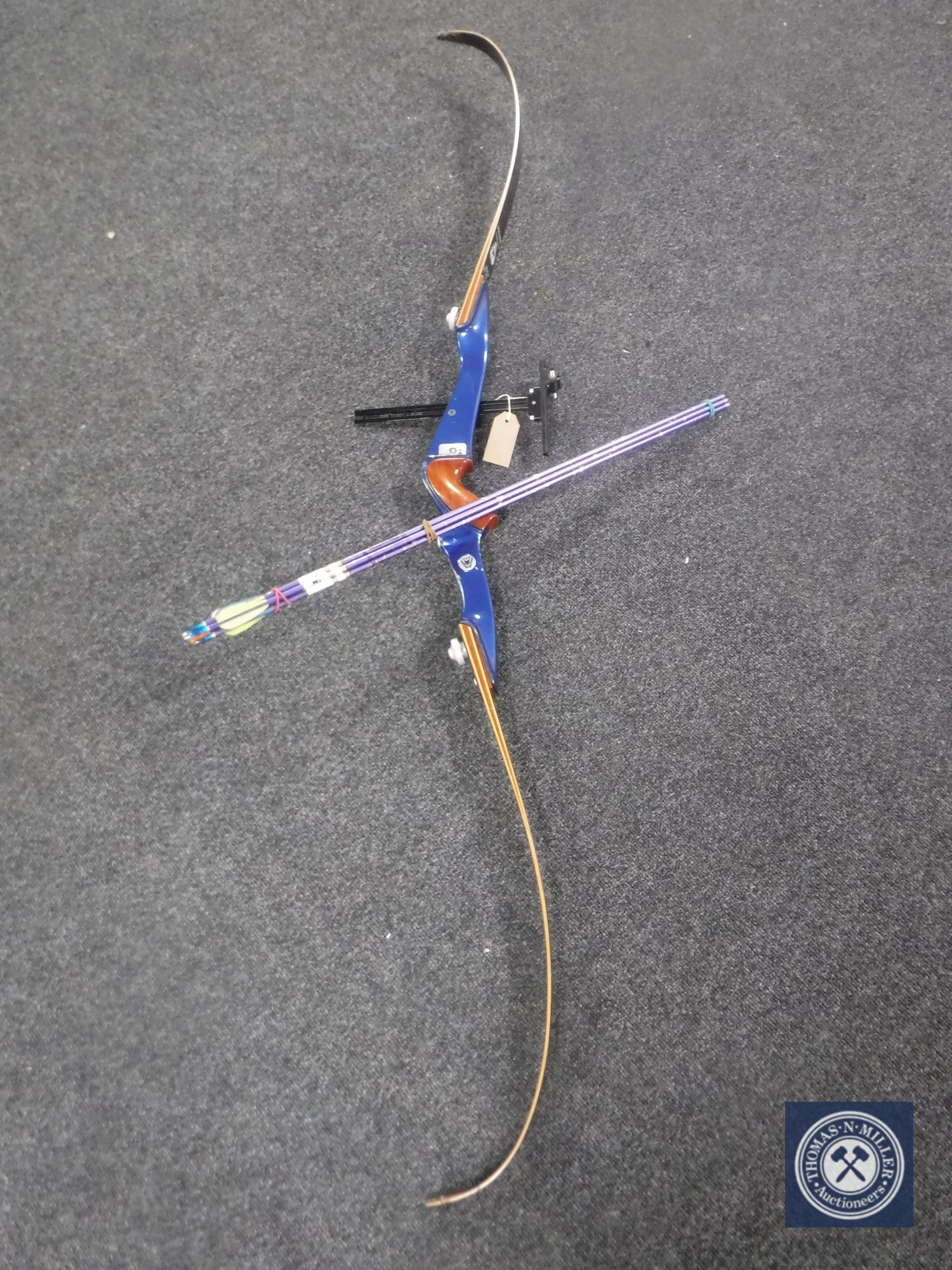A Meteor Archery bow with accessories CONDITION REPORT: This shows some ...