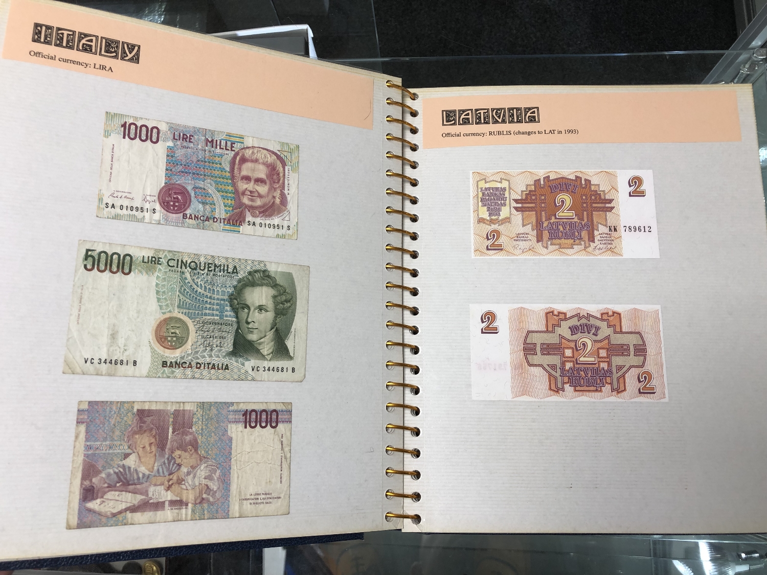 An International Currency Collection album containing banknotes of the ...