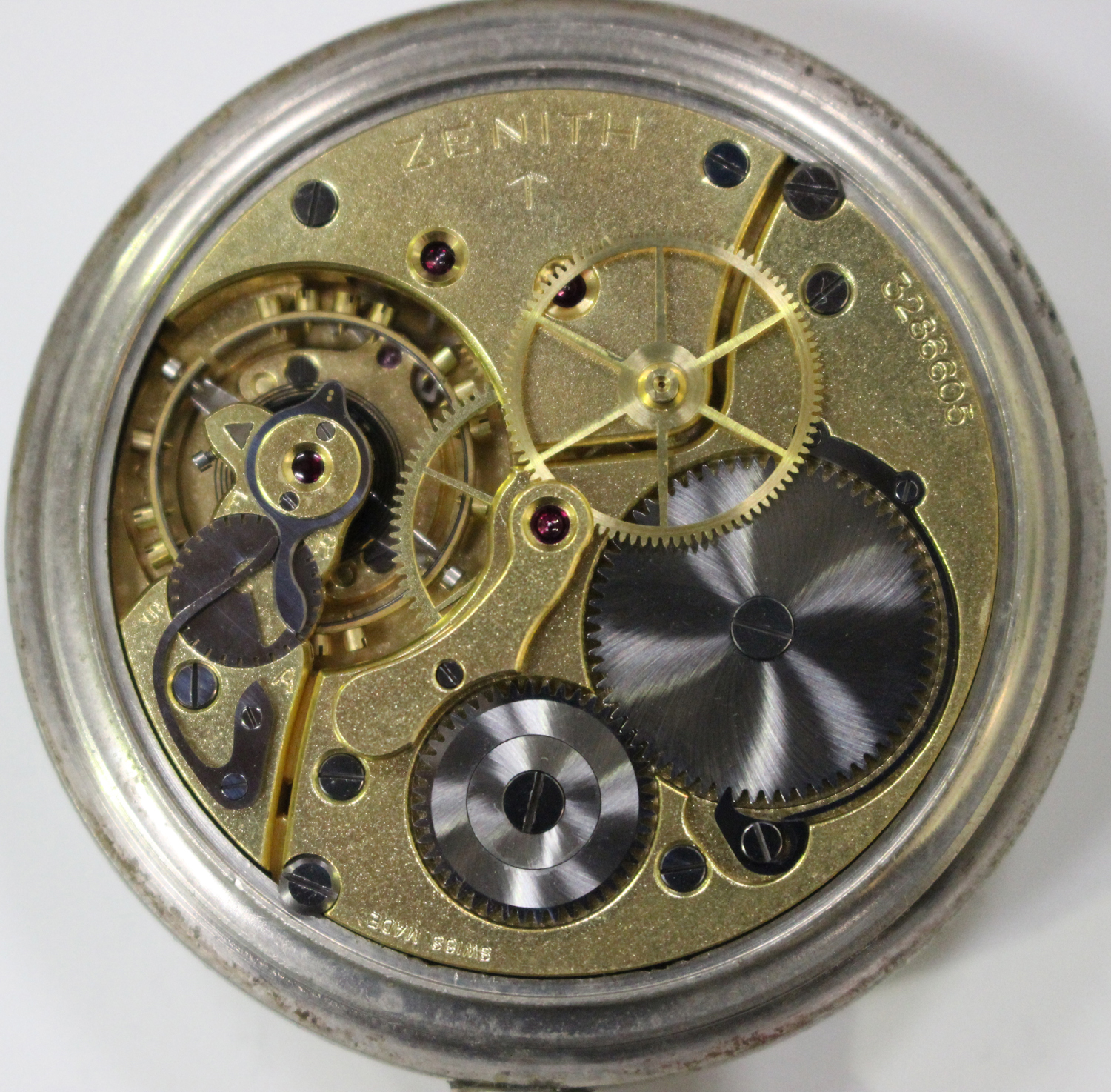A mid-20th century Zenith Royal Navy base metal cased keyless wind open ...