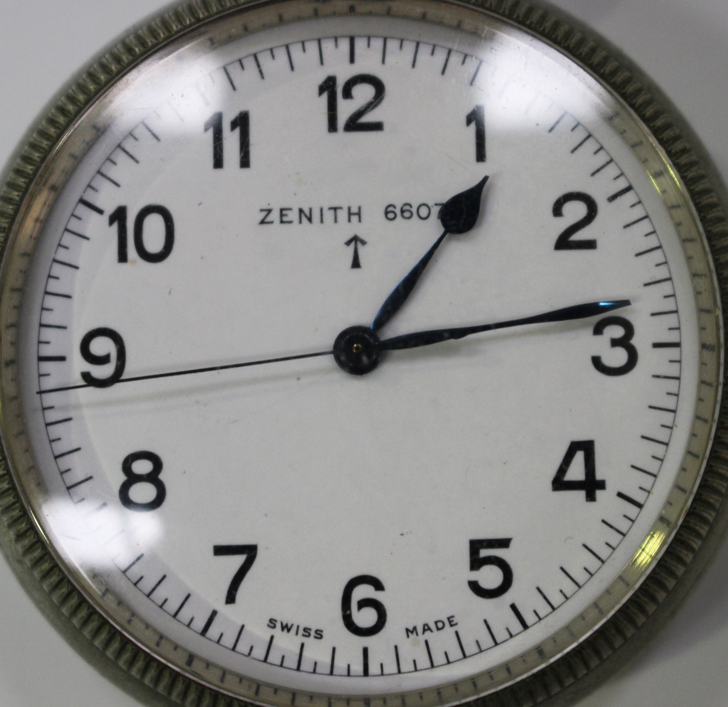 A mid-20th century Zenith Royal Navy base metal cased keyless wind open ...