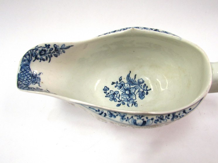 An 18th Century Lowestoft porcelain blue and white sauce boat printed ...