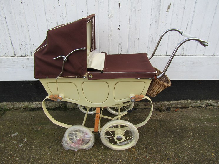 A 1950s Dunkley pram, professionally restored