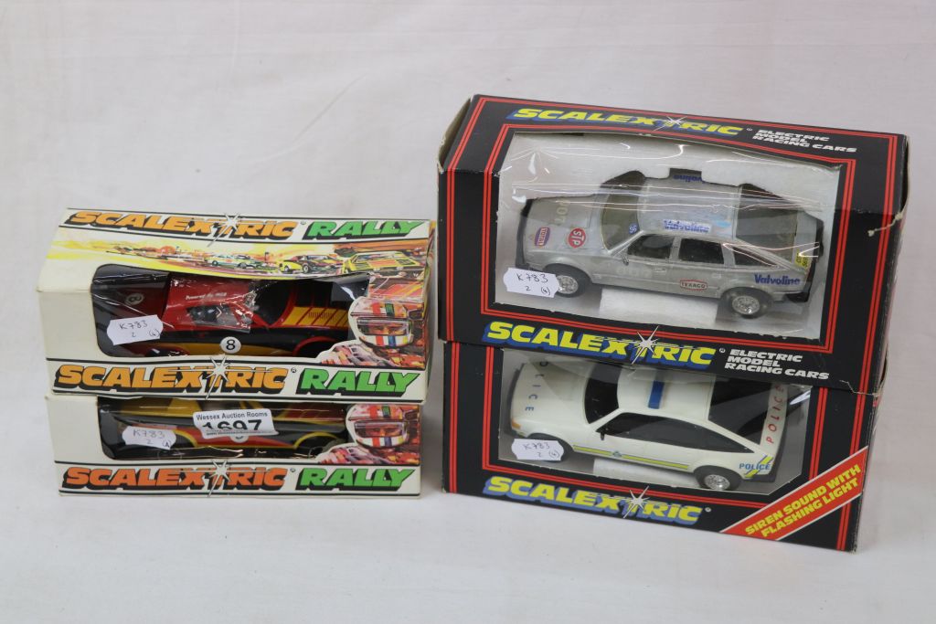 Four boxed Scalextric slot cars to include C113 Triumph TR7, C114 ...