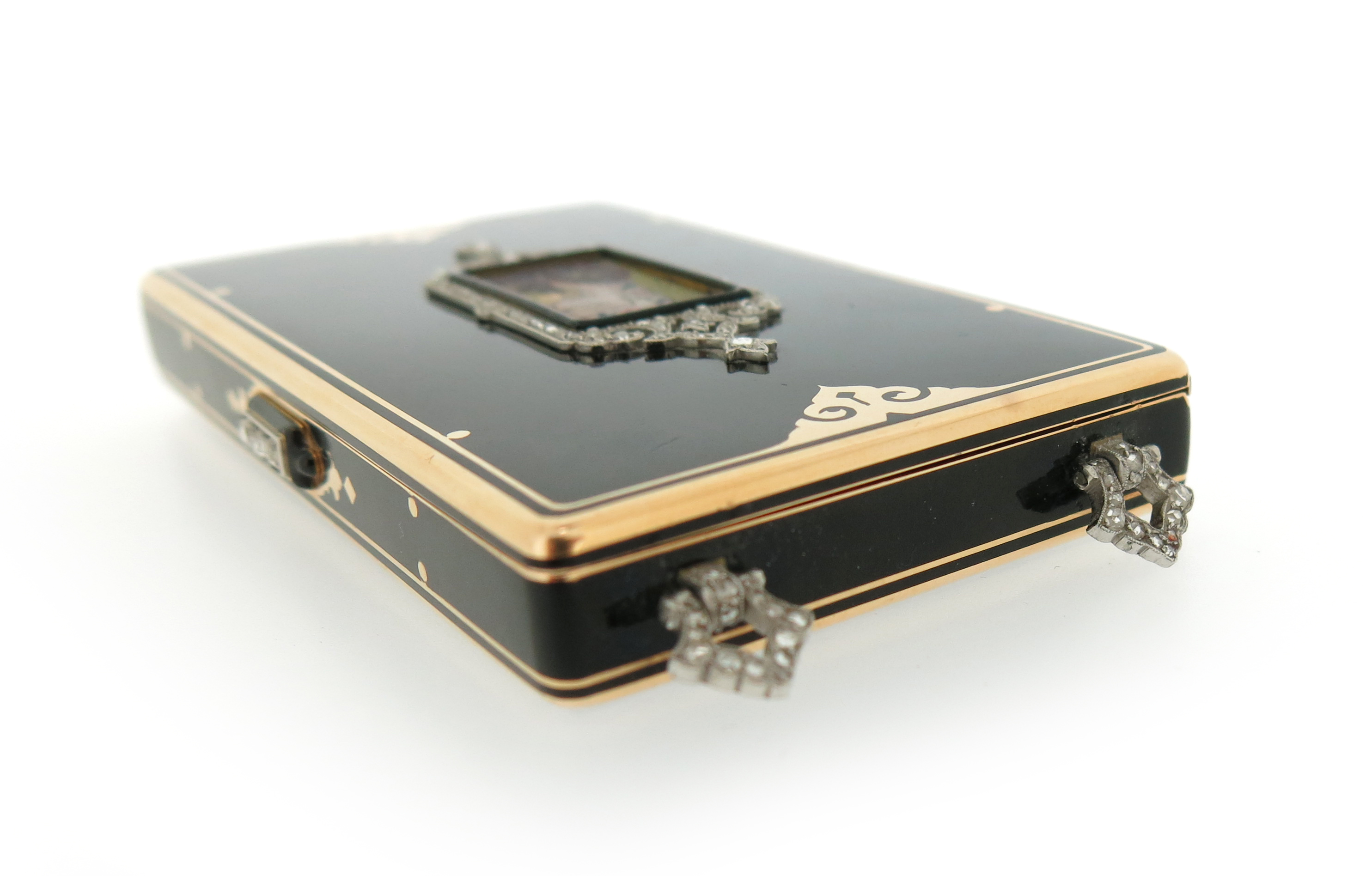 An Art Deco diamond and enamel compact by Cartier, of Islamic ...