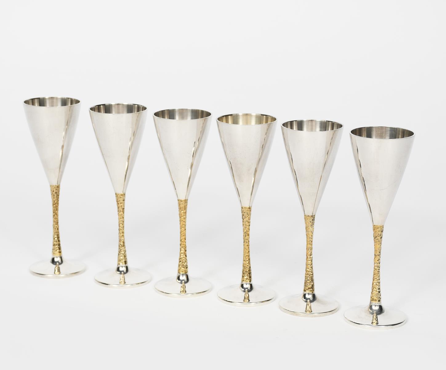 A set of six Stuart Devlin silver-gilt textured liqueur goblets ...