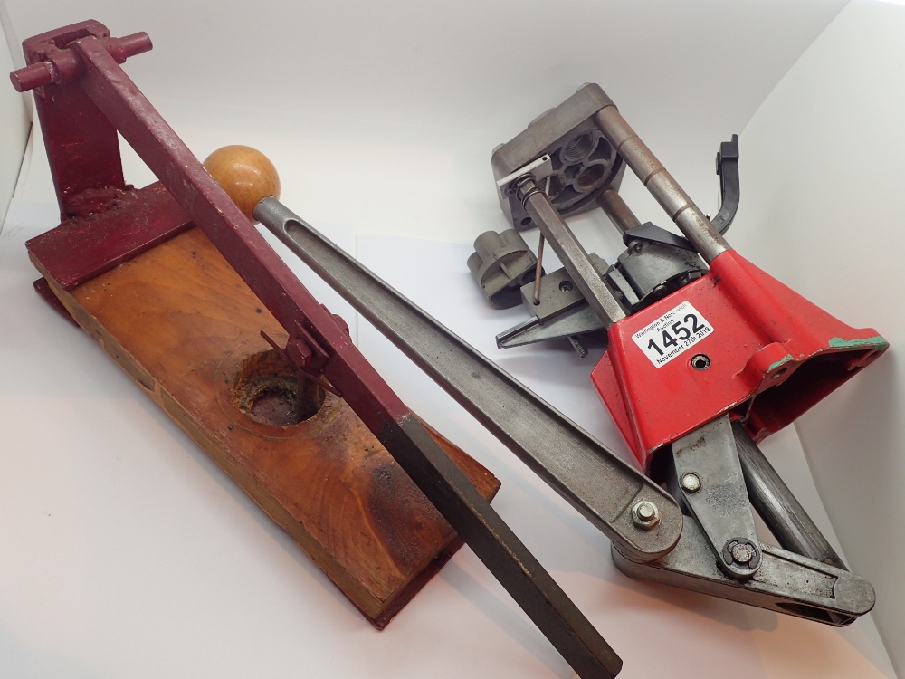 Two unnamed bullet presses