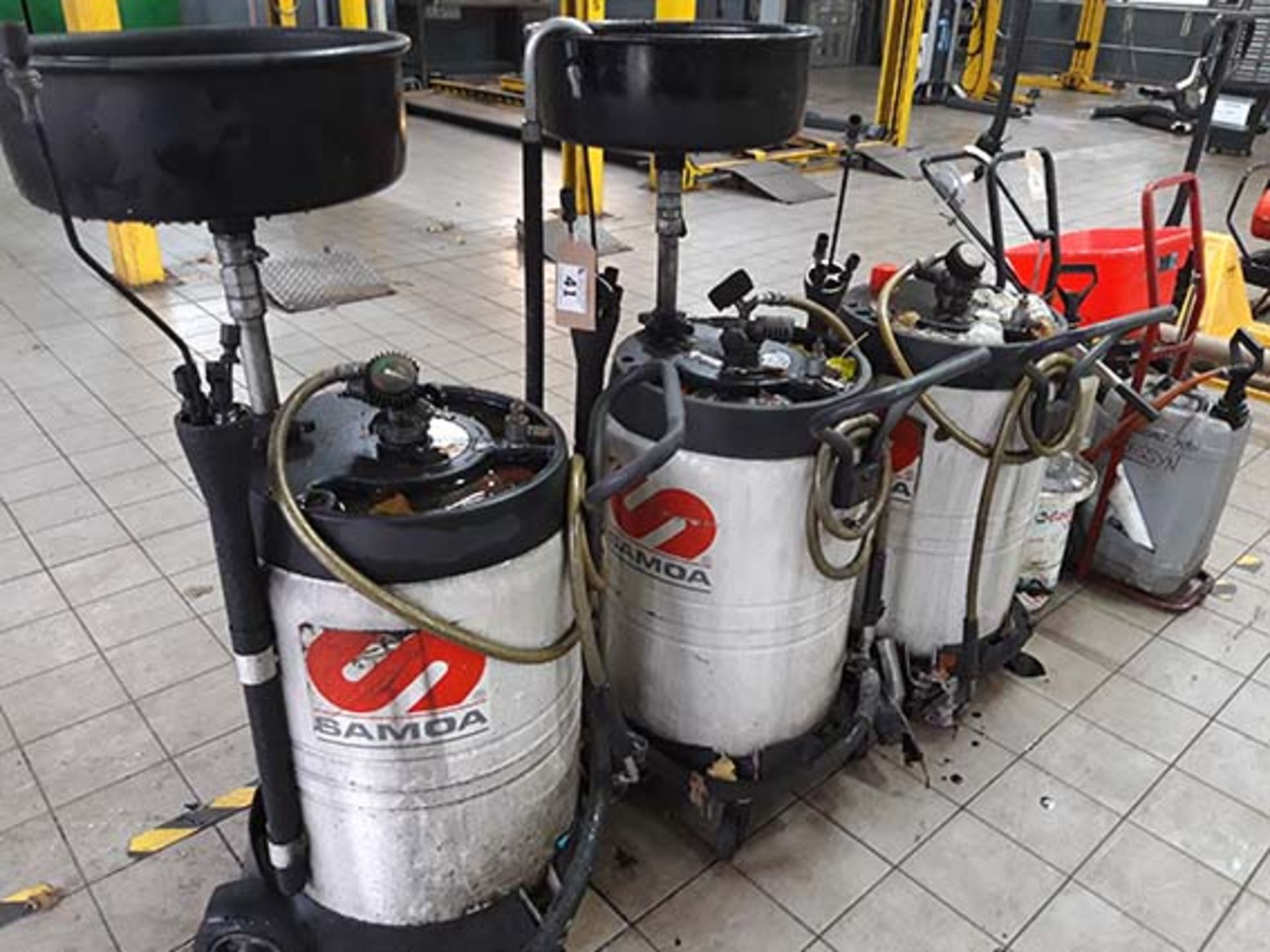 3 Samoa air operated oil sump drainers on trolleys