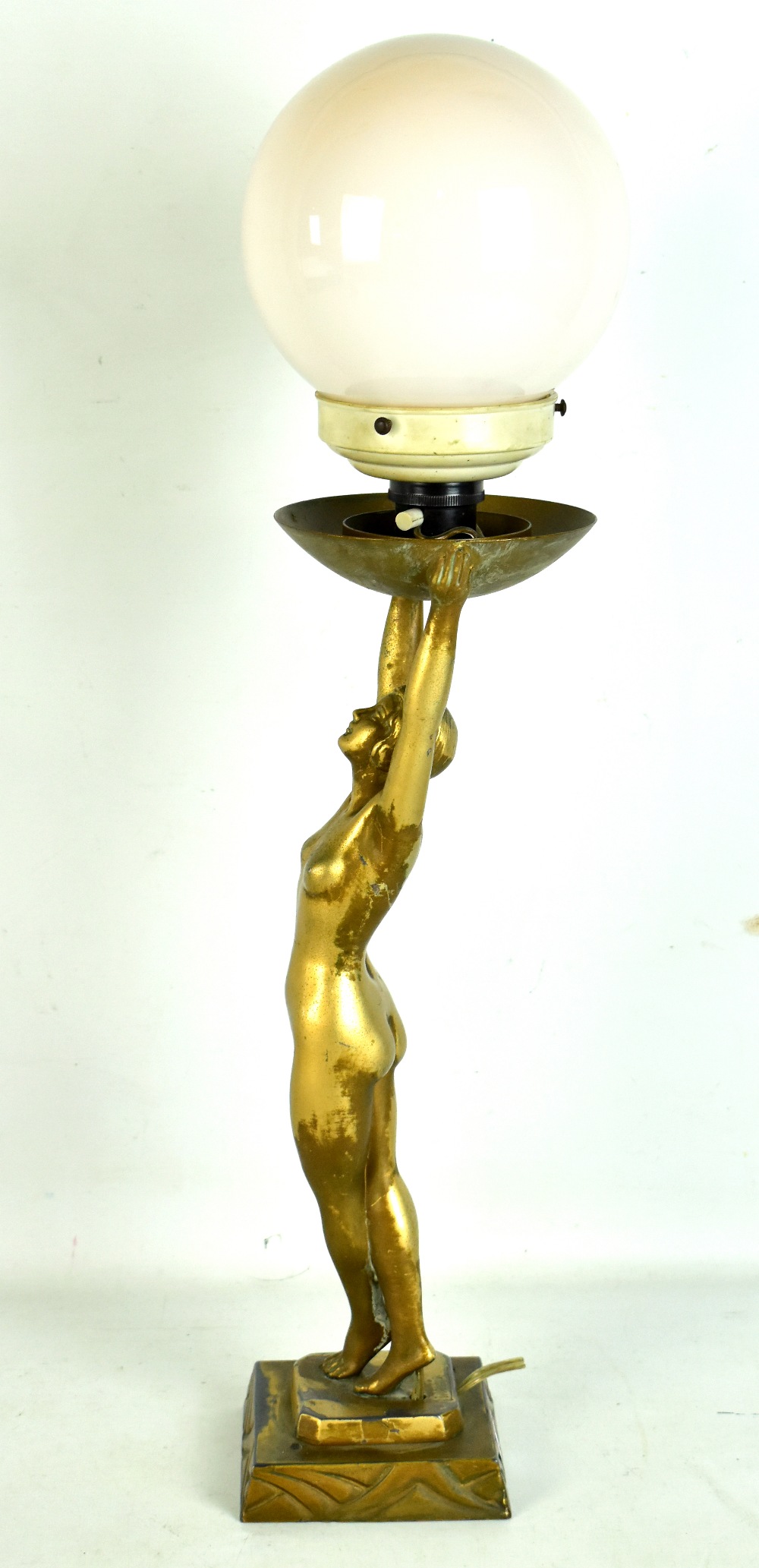 LIMOUSIN; an Art Deco bronzed spelter figural table lamp depicting a ...