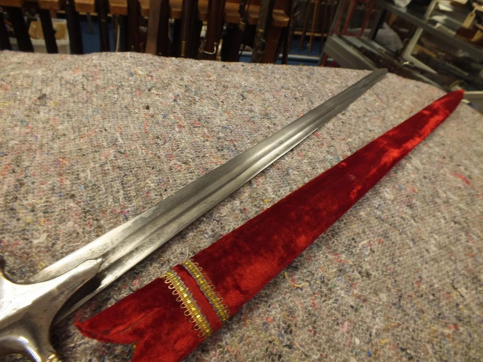A 19TH CENTURY INDIAN KIRACH OR STRAIGHT SWORD, 79.5cm double fullered ...