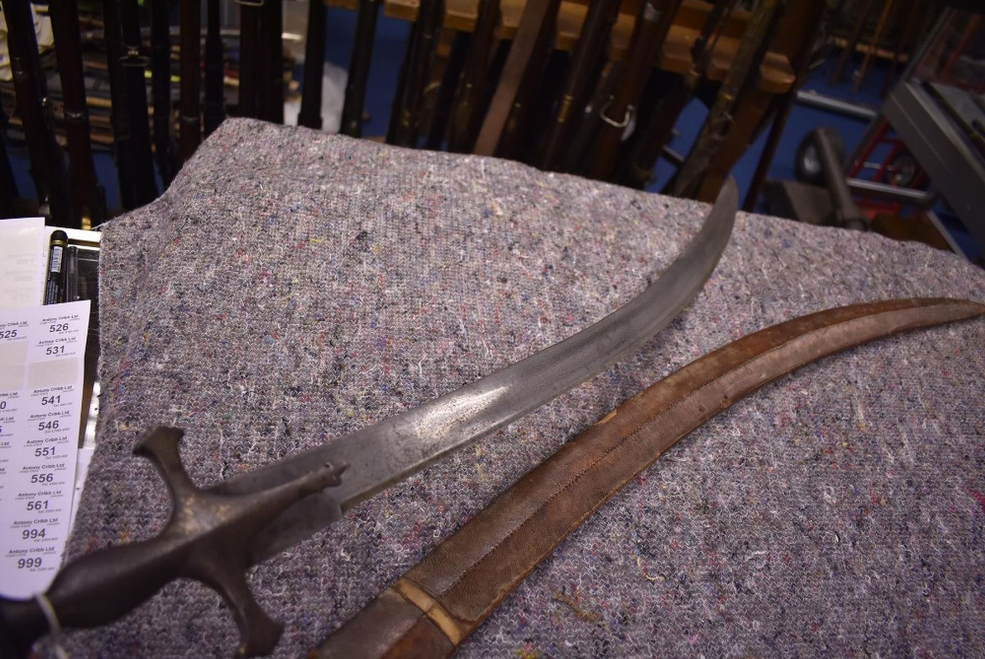 A 19TH CENTURY TULWAR, 77.5cm curved blade, probably damascus and ...