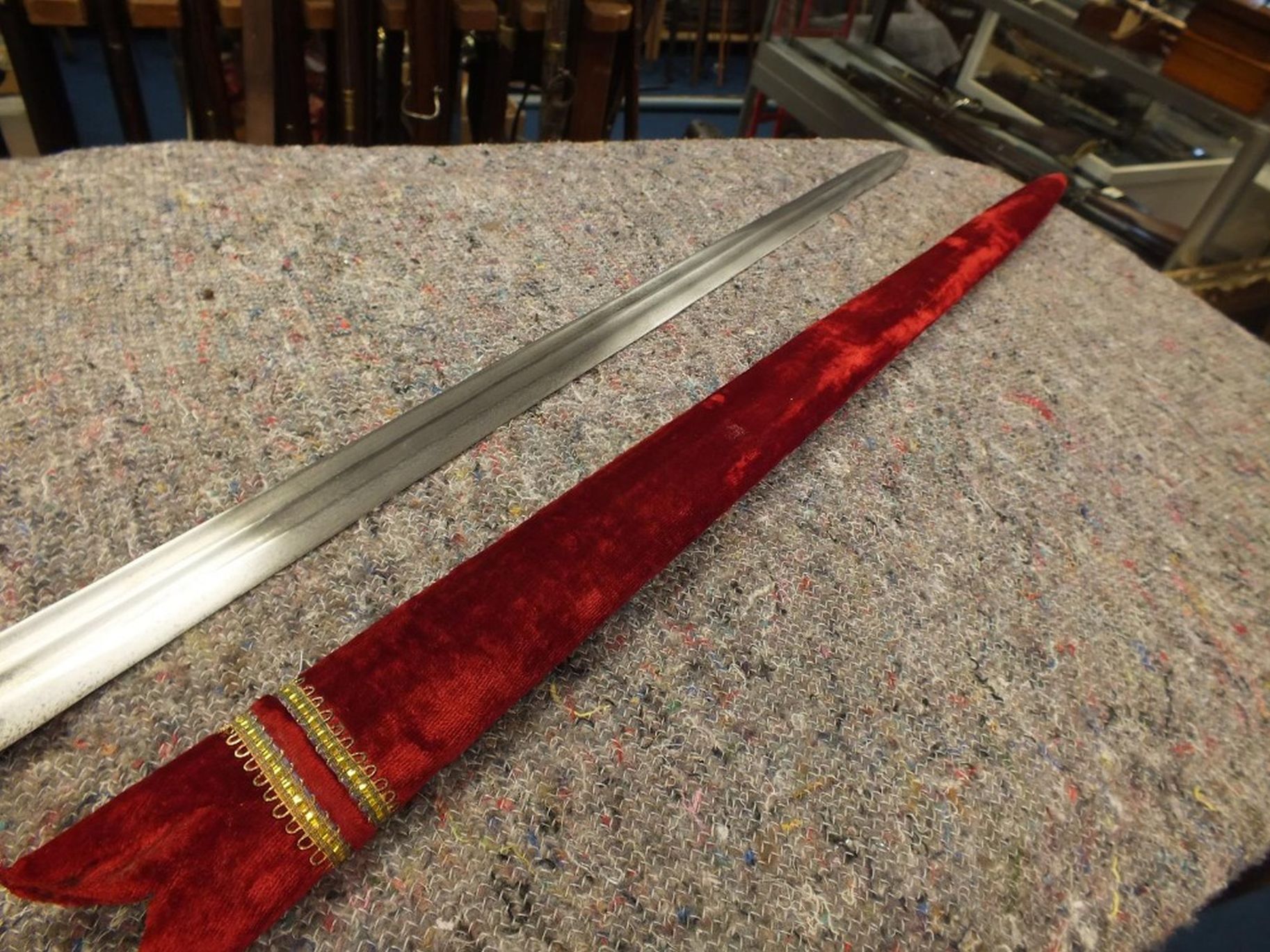 A 19TH CENTURY INDIAN KIRACH OR STRAIGHT SWORD, 79.5cm double fullered ...