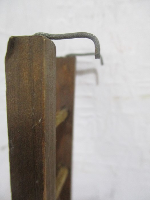A wooden and card Elastolin stable with two cart horses, hay manger ...
