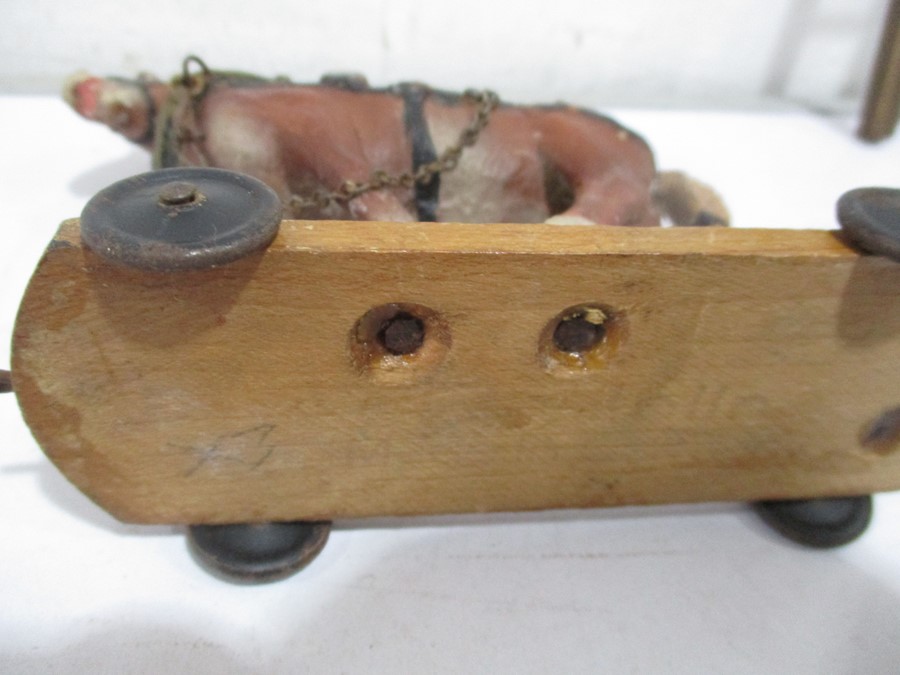 A wooden and card Elastolin stable with two cart horses, hay manger ...