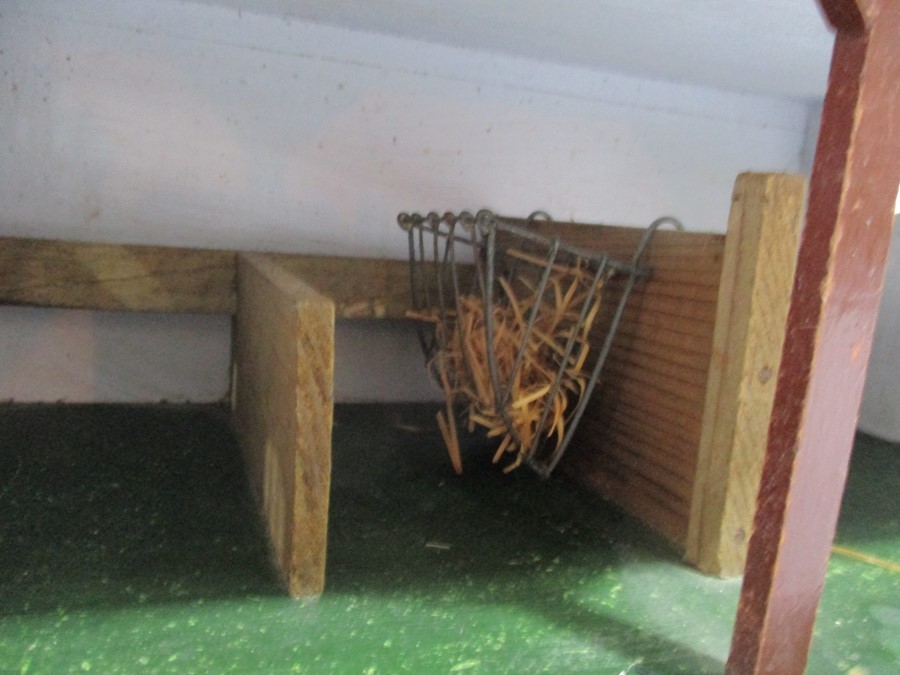 A wooden and card Elastolin stable with two cart horses, hay manger ...