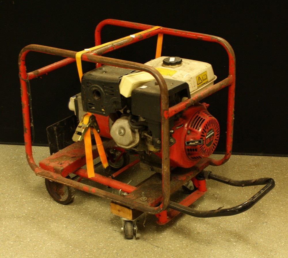 A Honda GX240 site generator, max output 3.75kva, 3.0kw, on trolley