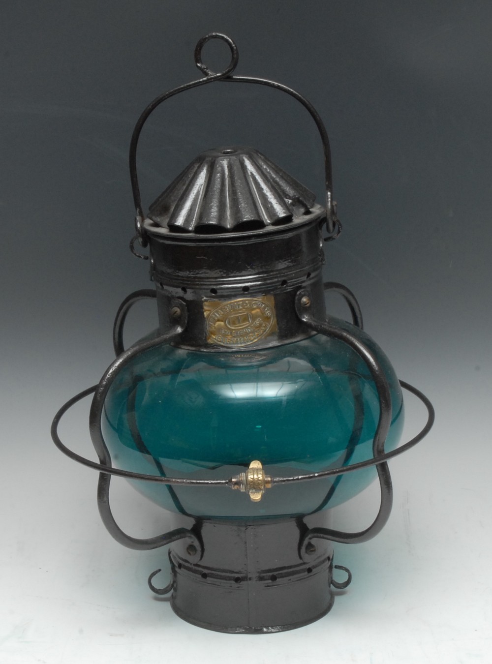 A Victorian iron and electric green glass gimbal lantern, by Wm Harvie ...