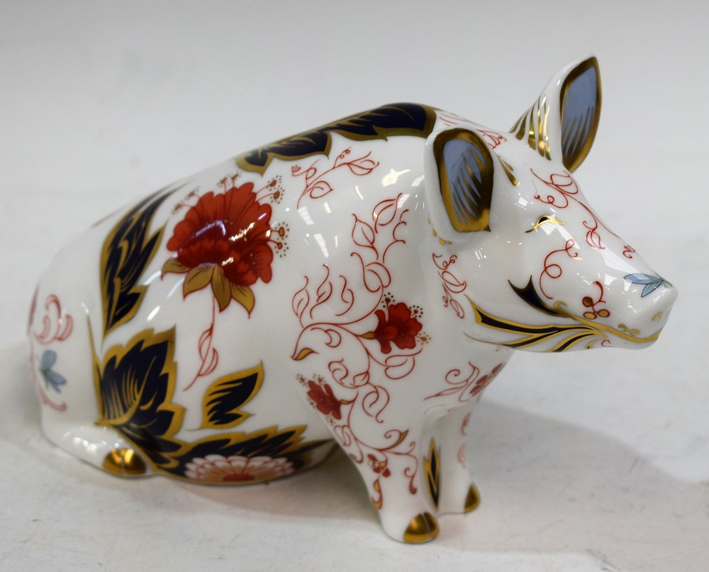 A Royal Crown Derby money box, Prudence the Pig, printed in the Imari ...