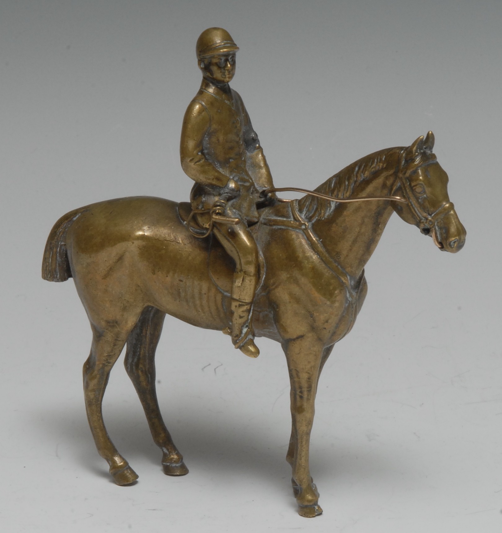 An Austrian gilt bronze, of a huntsman on a horse, 13cm high, marked ...