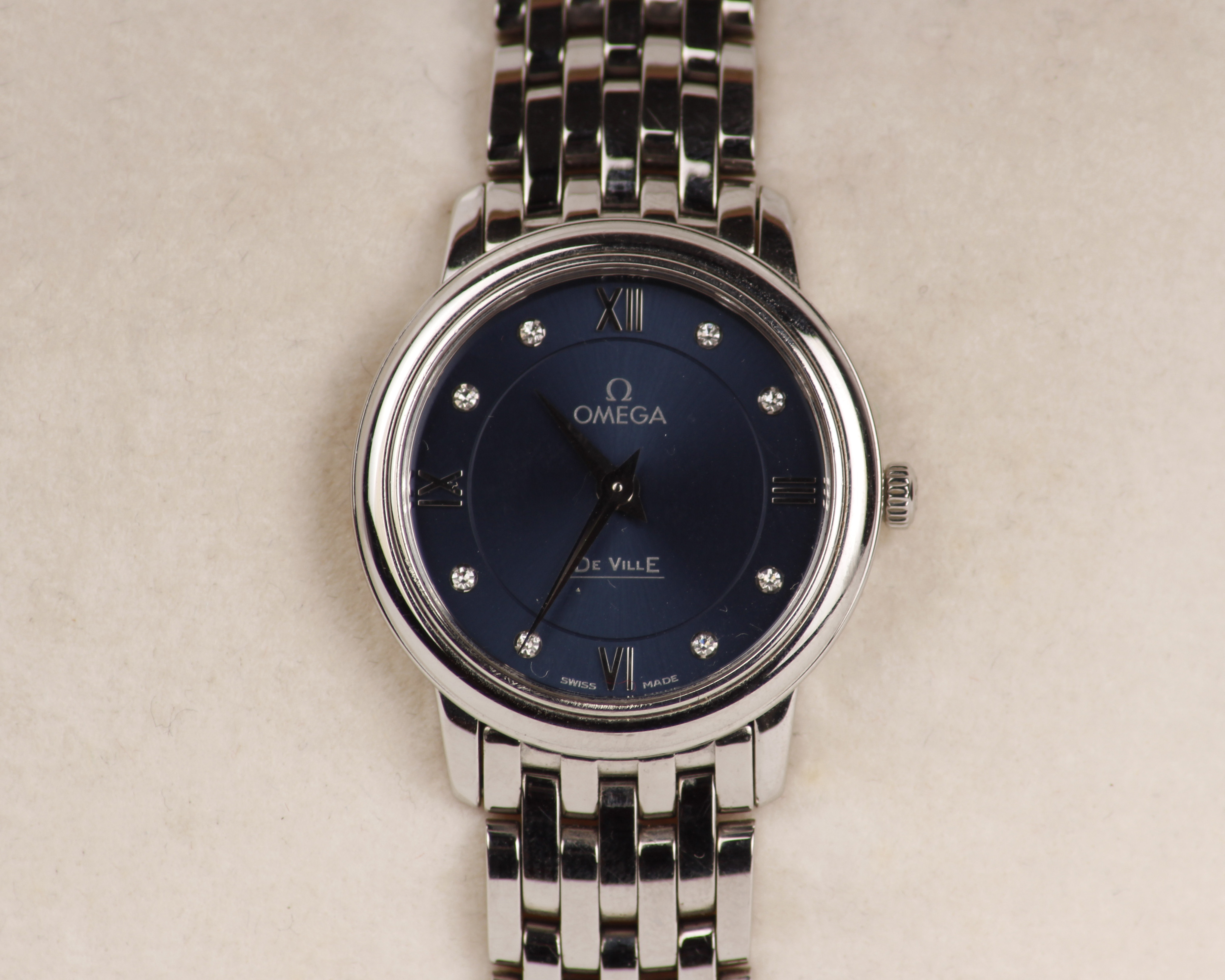 A Ladies Omega DeVille Quartz movement wristwatch in white metal with ...
