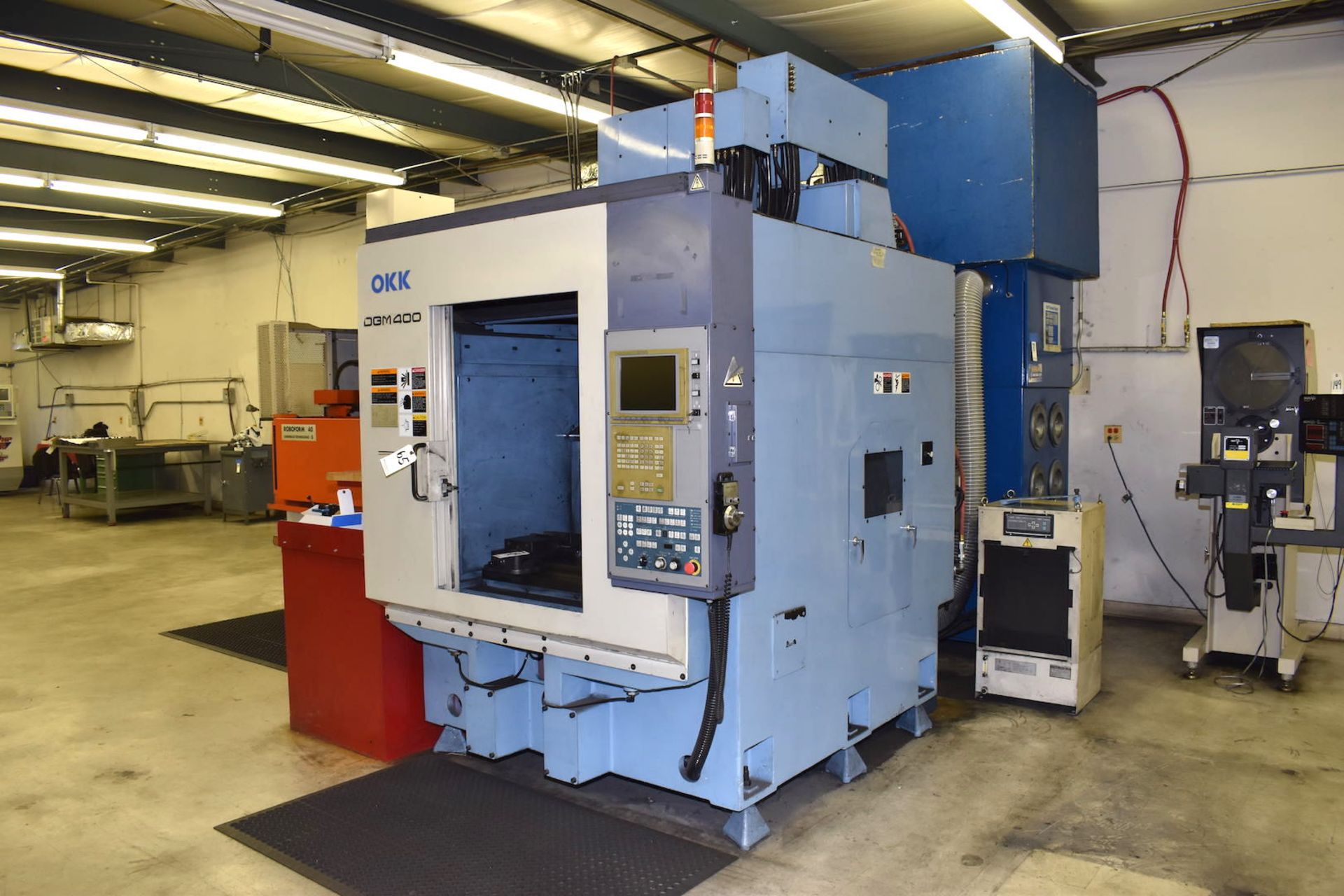 2001 OKK Model DGM 400 CNC High Speed Vertical Graphite Milling Machine ...