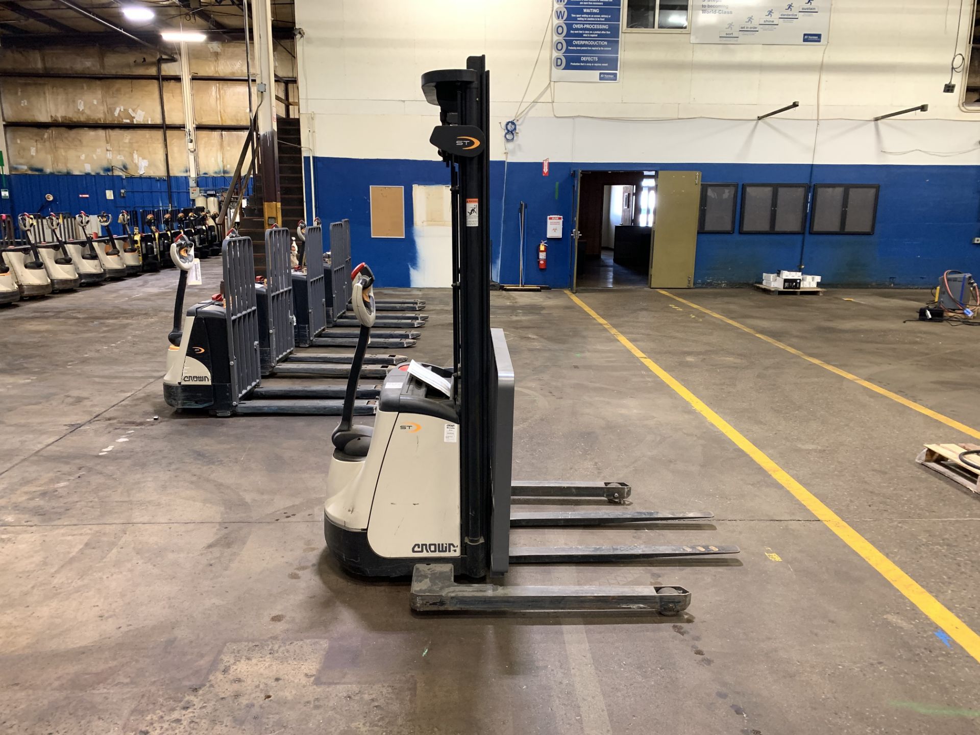 CROWN 2,000 LB. WALKIE STACKER, MODEL ST3000-20, 24-VOLT, 128’’ LIFT ...