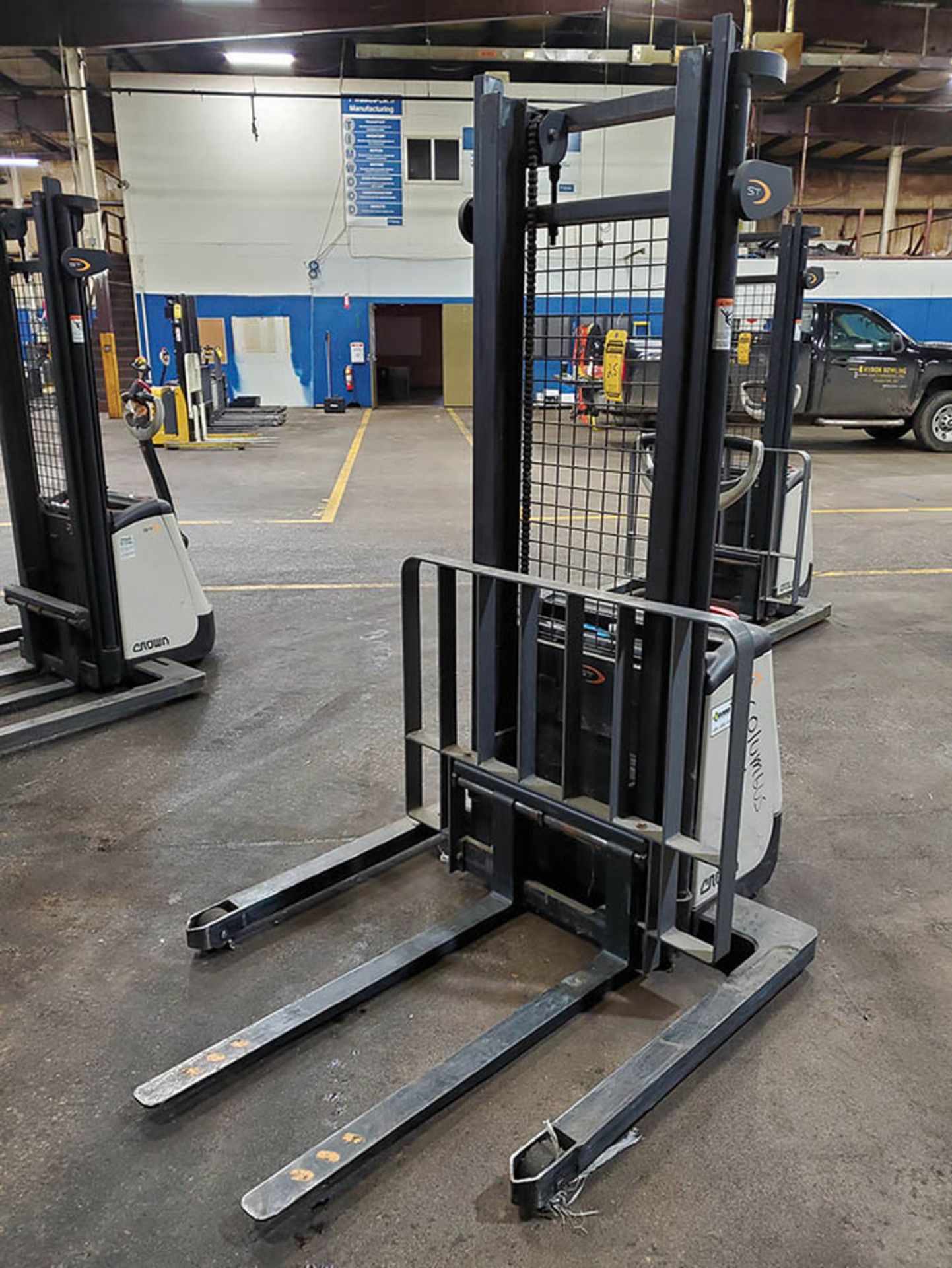 CROWN 2,000 LB. WALKIE STACKER, MODEL ST3000-20, 24-VOLT, 128’’ LIFT ...
