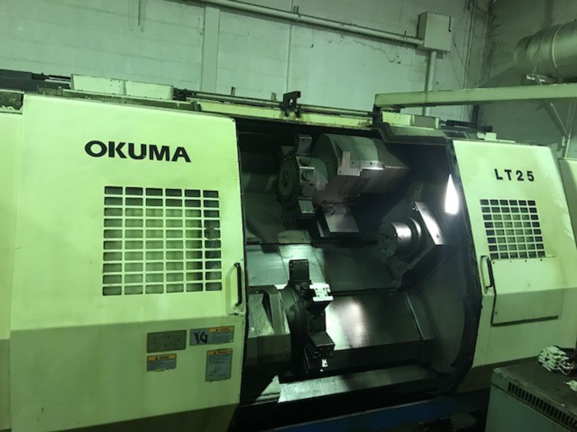 Okuma LT25 CNC lathe, S/N 0073, New 2000 Control OSP U100L, Number of ...