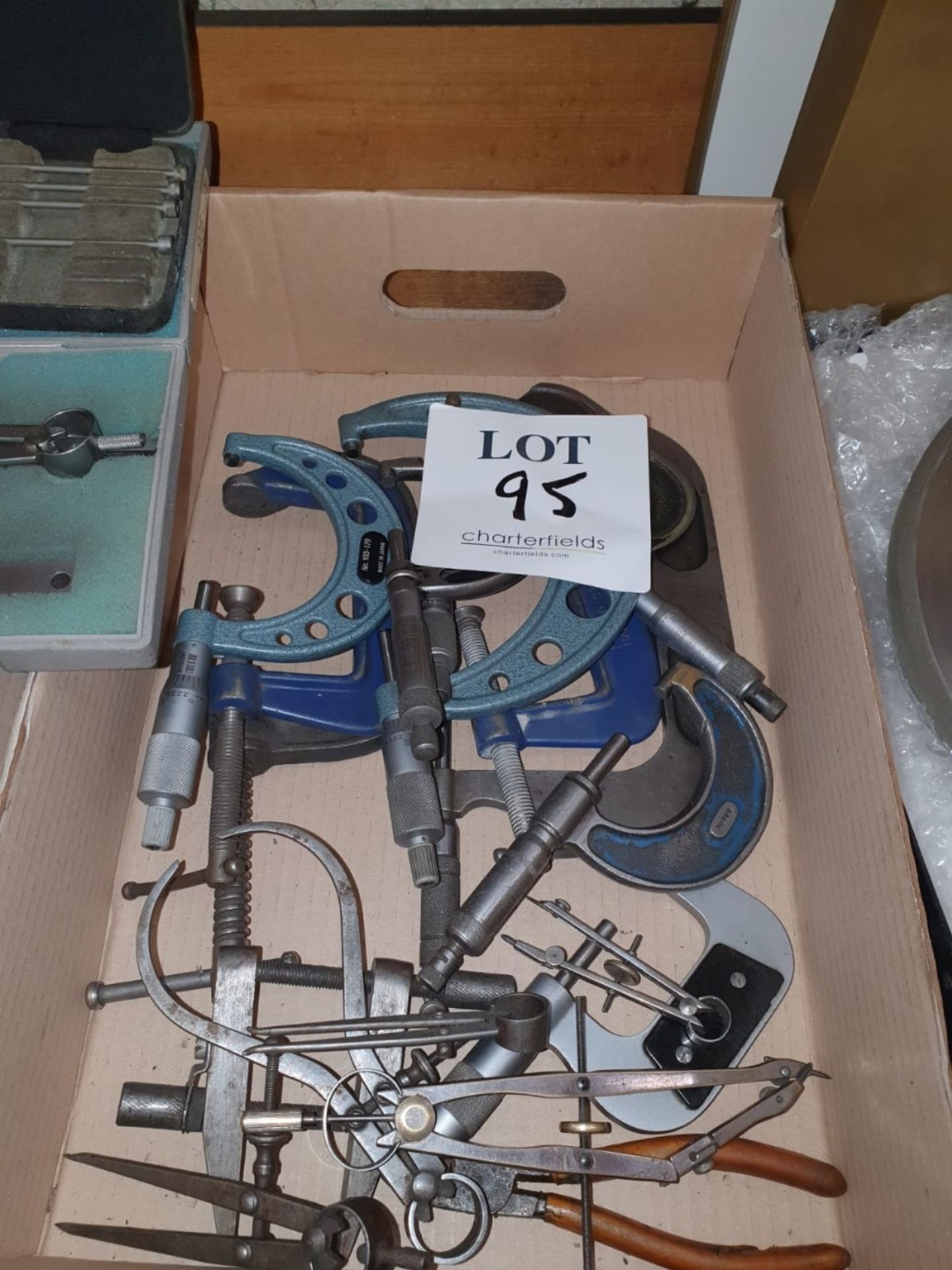 Box of various micrometers, clamps, dividers, calipers