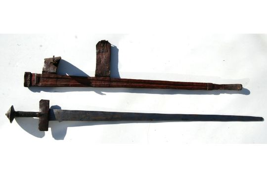 A 19th century east African Takoba sword with crescent moons to the ...