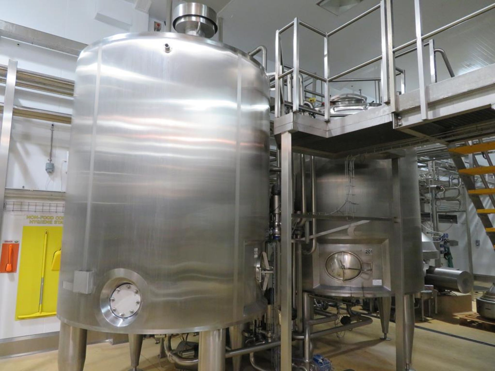 2 x stainless steel 10,000 litre whey buffer tanks approx 2.25m dia, 4m ...