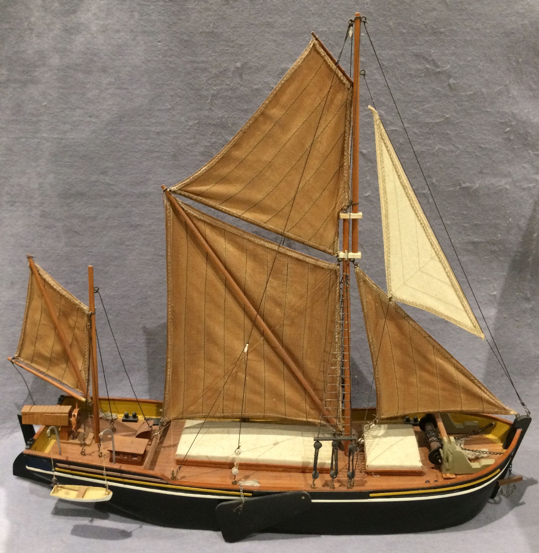 A wooden model of a two masted boat, 72cm x 60cm high