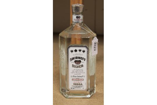 A litre bottle of Smirnoff Silver Label Private Reserve vodka c.1980's